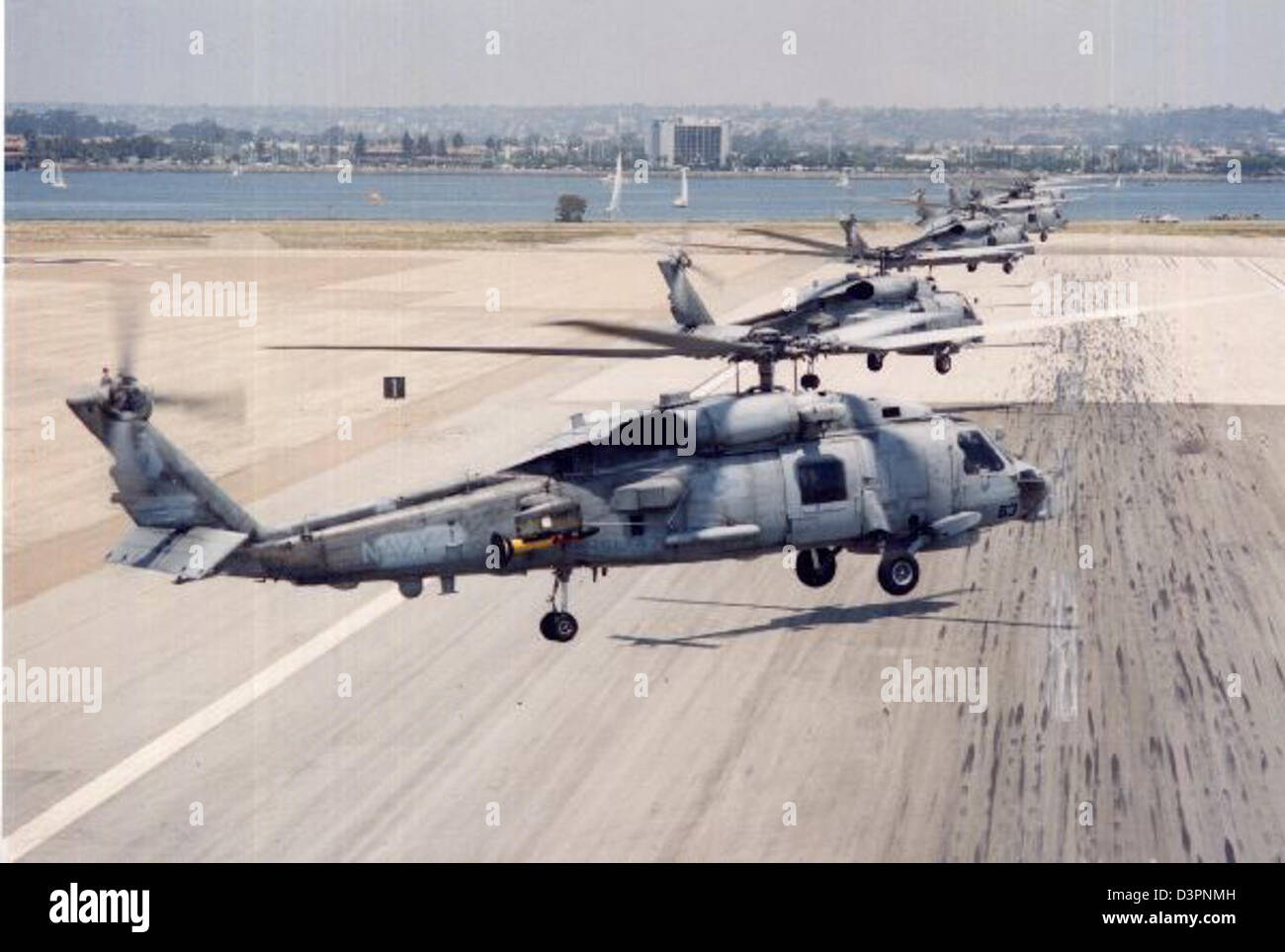 The 5 HSL 47 SH-60B Seahawk helicopters lifting off from Naval ...