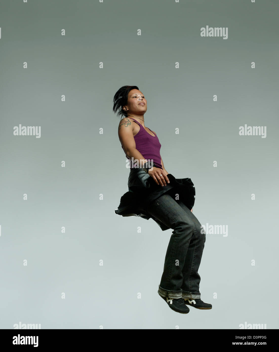 Humans floating frozen in mid air Stock Photo - Alamy