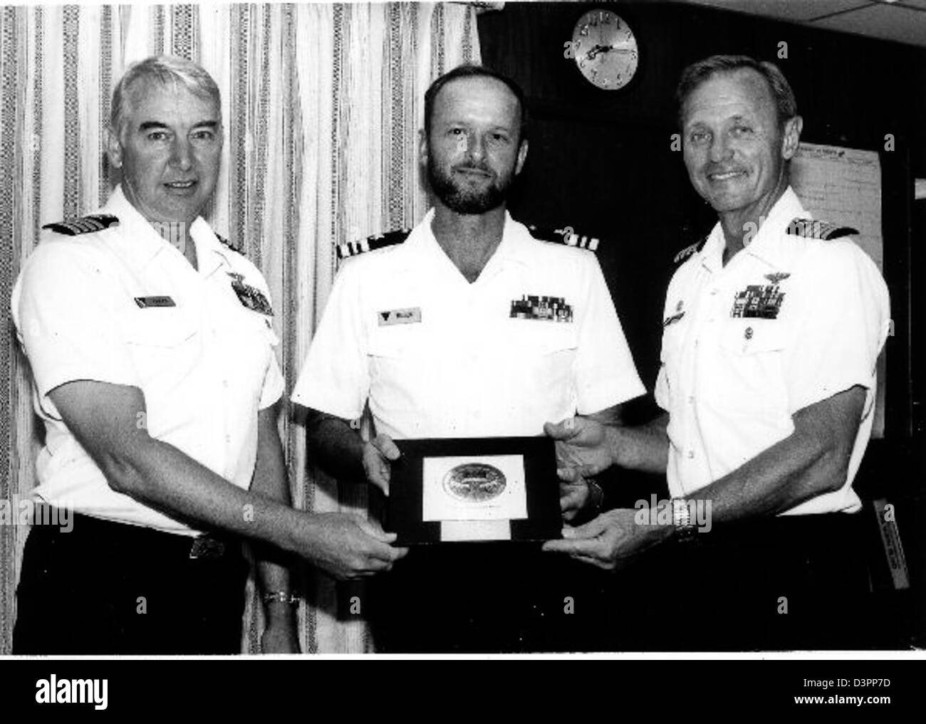 A historical photograph showing the Commanding Officer of NAS North ...