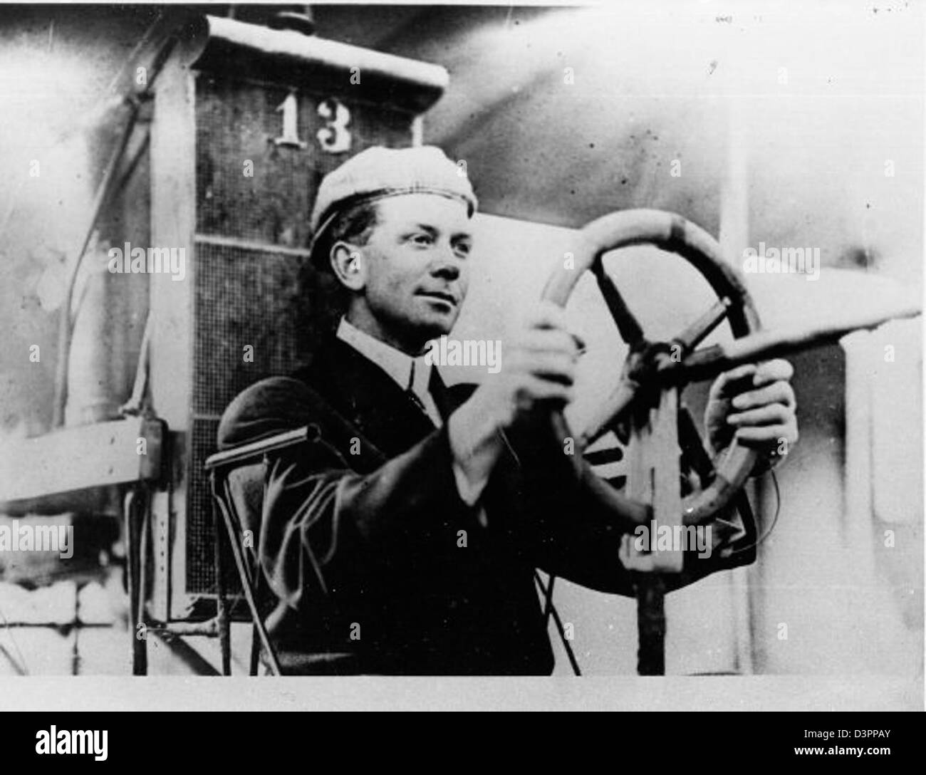 The photograph shows Theodore Ellyson, the first U.S. Navy aviator, at ...