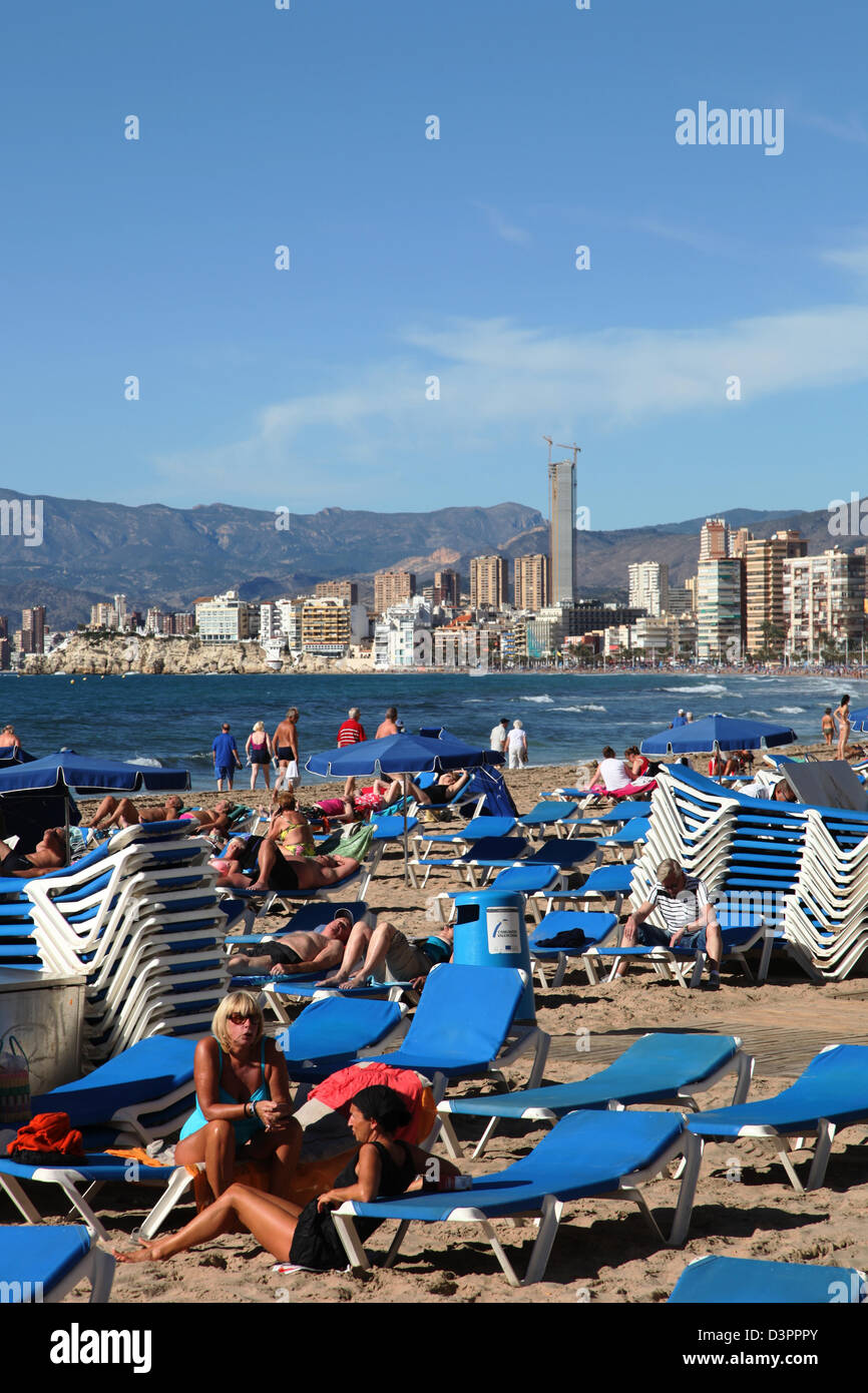 Beach scene on a sunny day with a blue sky at Playa Levante Benidorm ...
