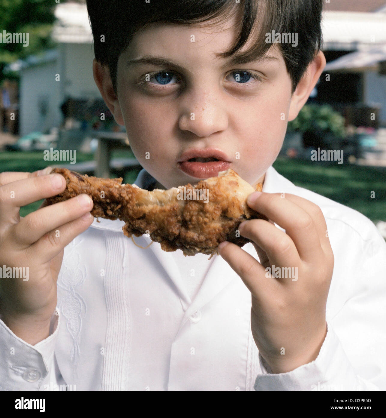 Man eating drumstick hi-res stock photography and images - Alamy