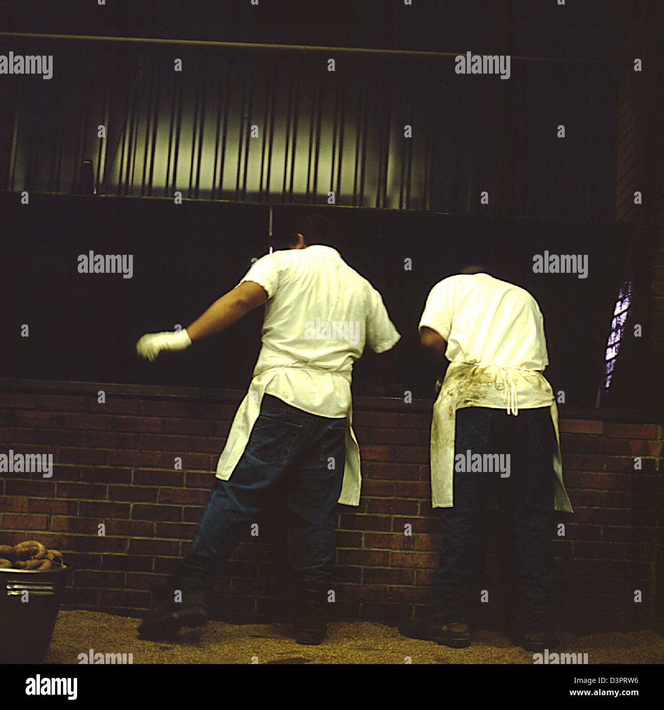 Two men working Stock Photo - Alamy