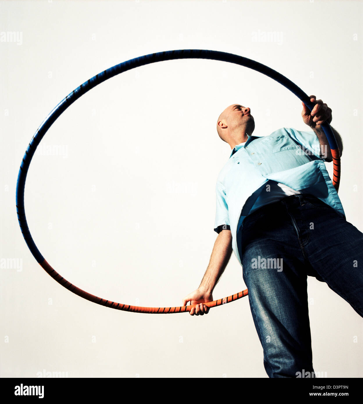 Man Hula Hooping Stock Photo - Alamy