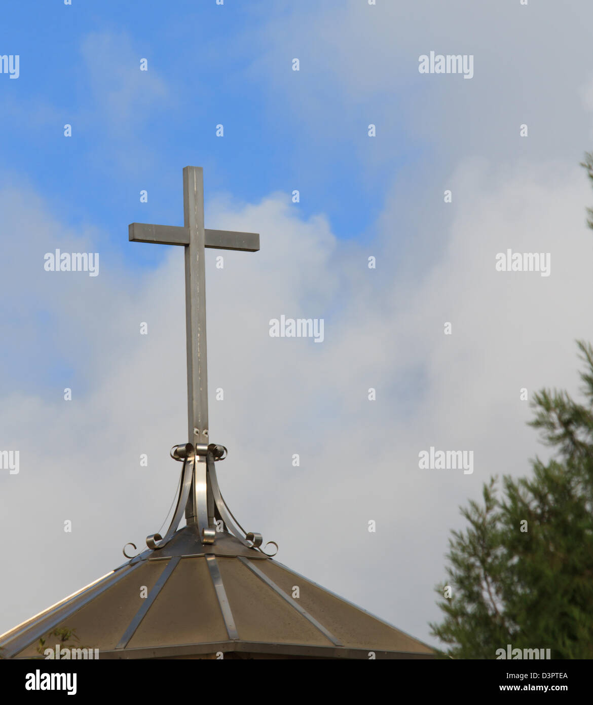 Cross on rooftop of a church Stock Photo - Alamy