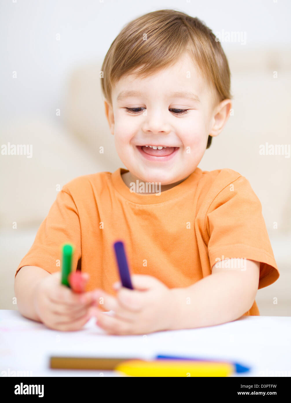 Boy Using Crayons High Resolution Stock Photography and Images - Alamy