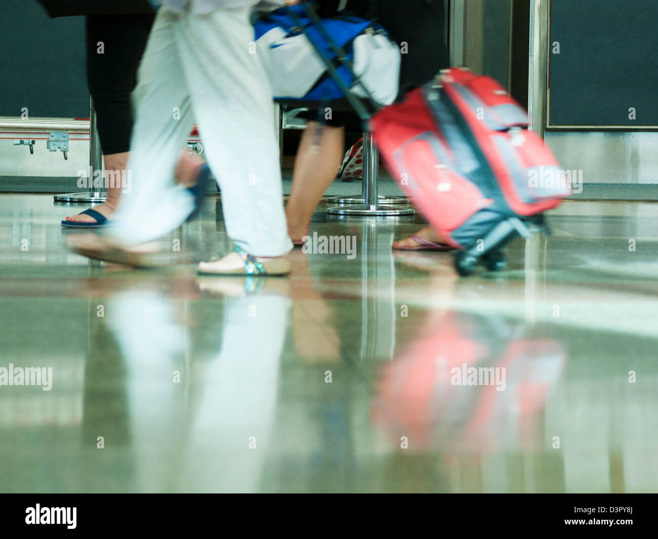 People moving in motion at Denver International Airport, Colorado Stock ...