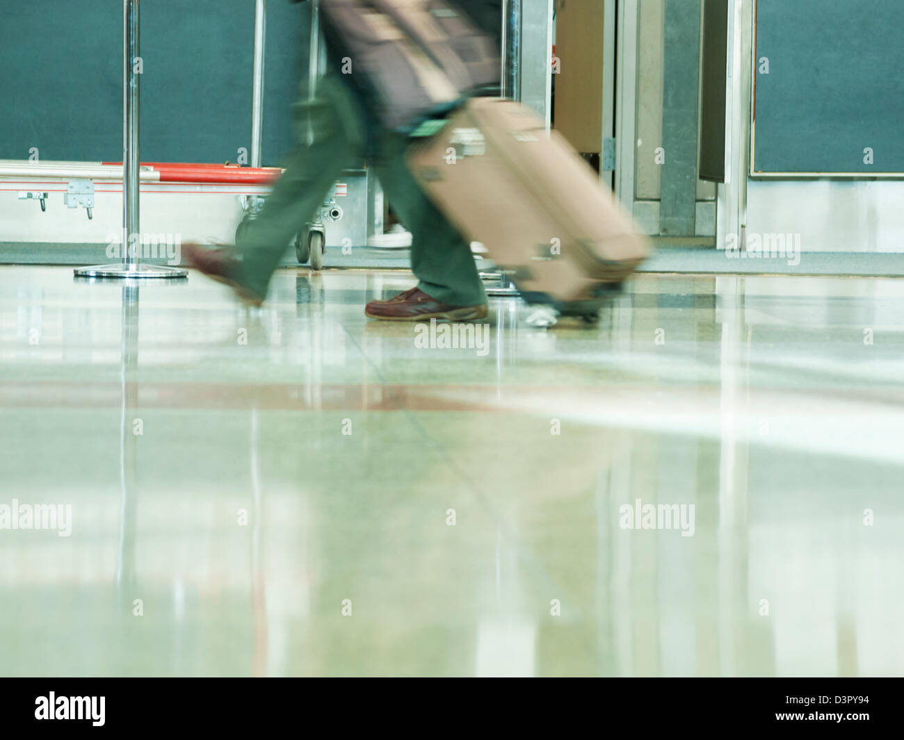 People moving in motion at Denver International Airport, Colorado Stock ...