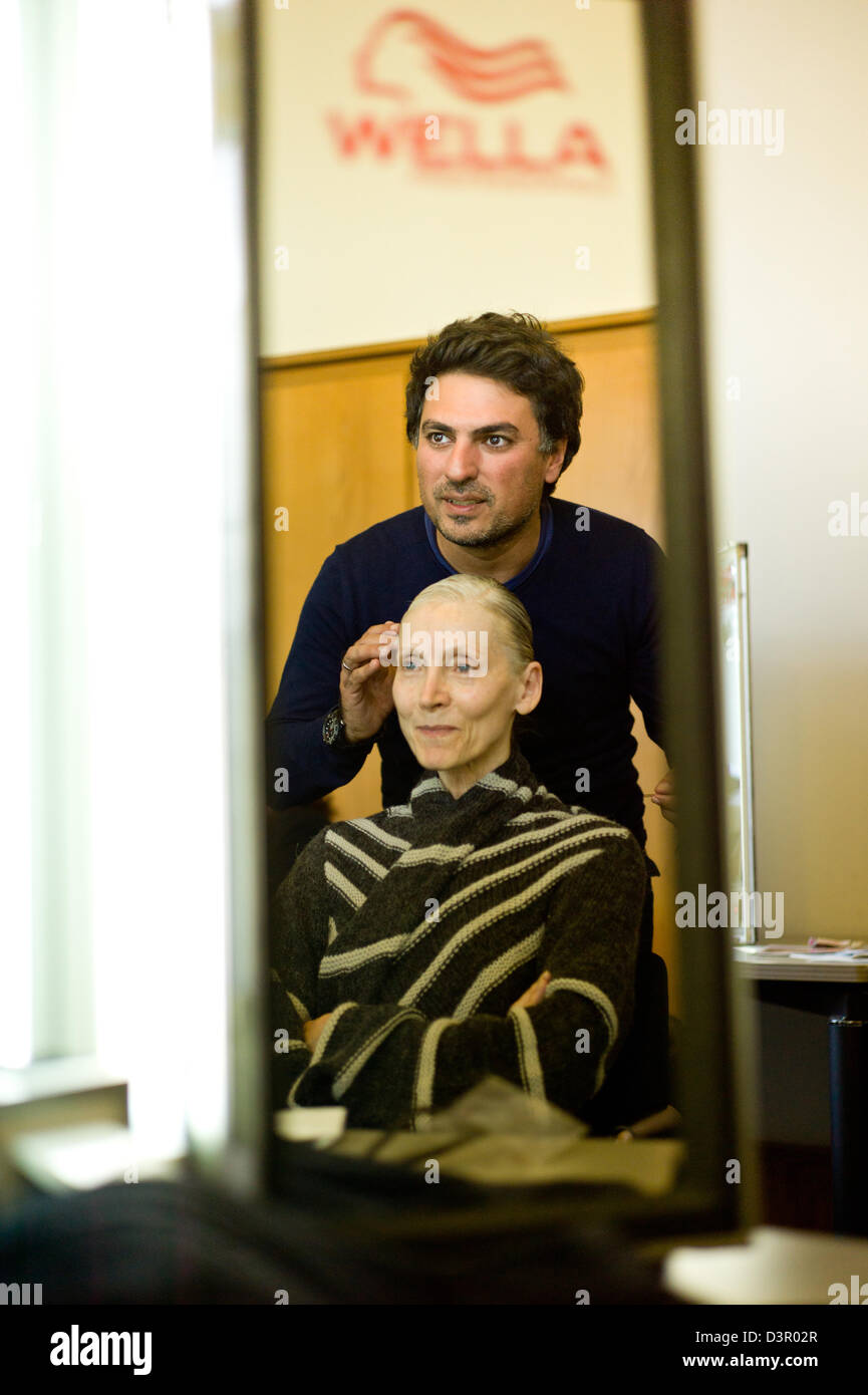 Berlin, Germany, from Wella profession stylist prepares a model for the ...