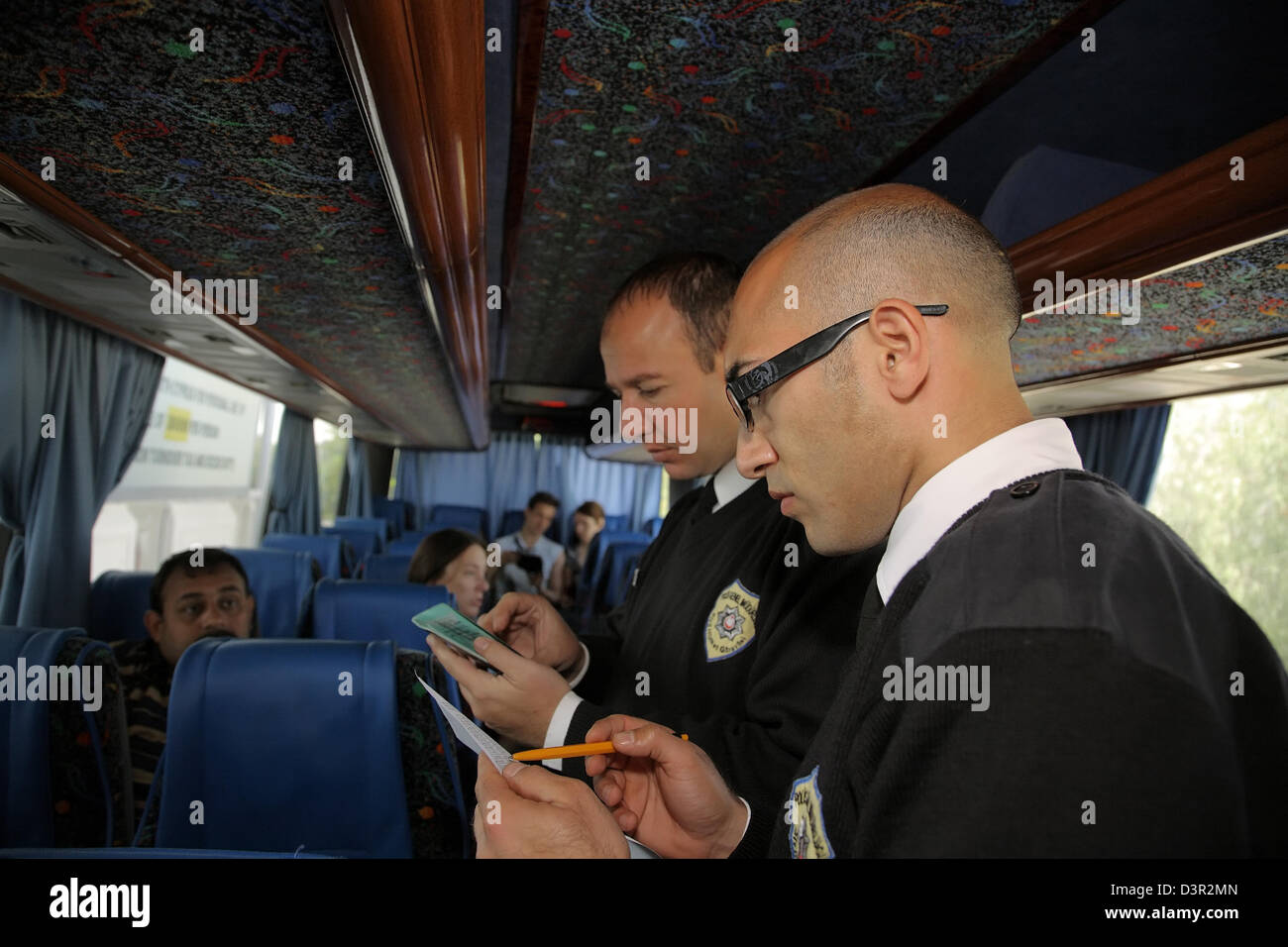 Customs officers during border control of a bus, Nicosia, Northern ...