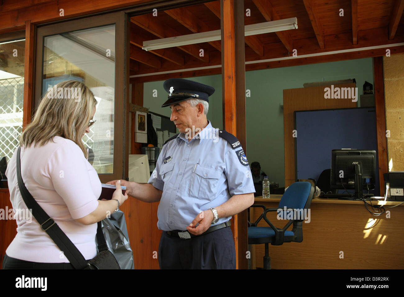 A policeman at the border crossing Ledra Street, Nicosia, Cyprus Stock ...