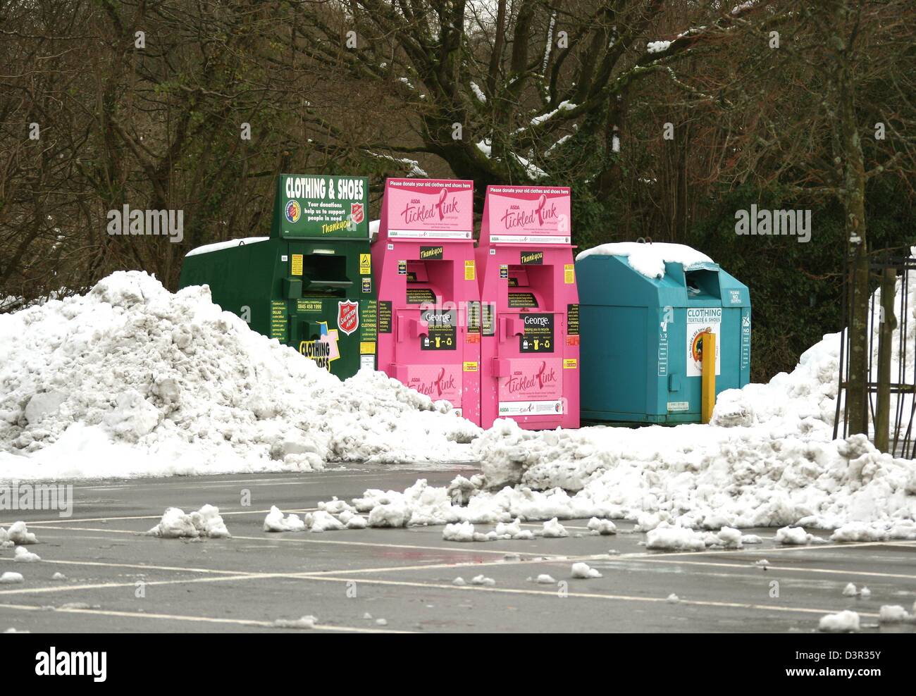 Row Of Clothing Recycling Bins In An Asda Supermarket Car Park Stock ...