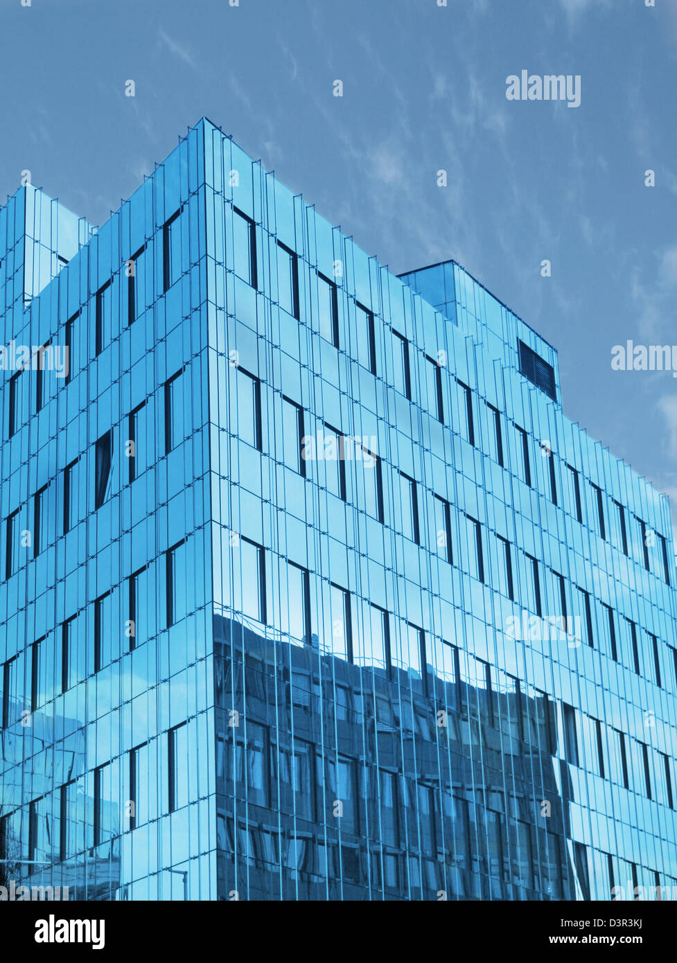 glass office building reflecting the sky Stock Photo - Alamy