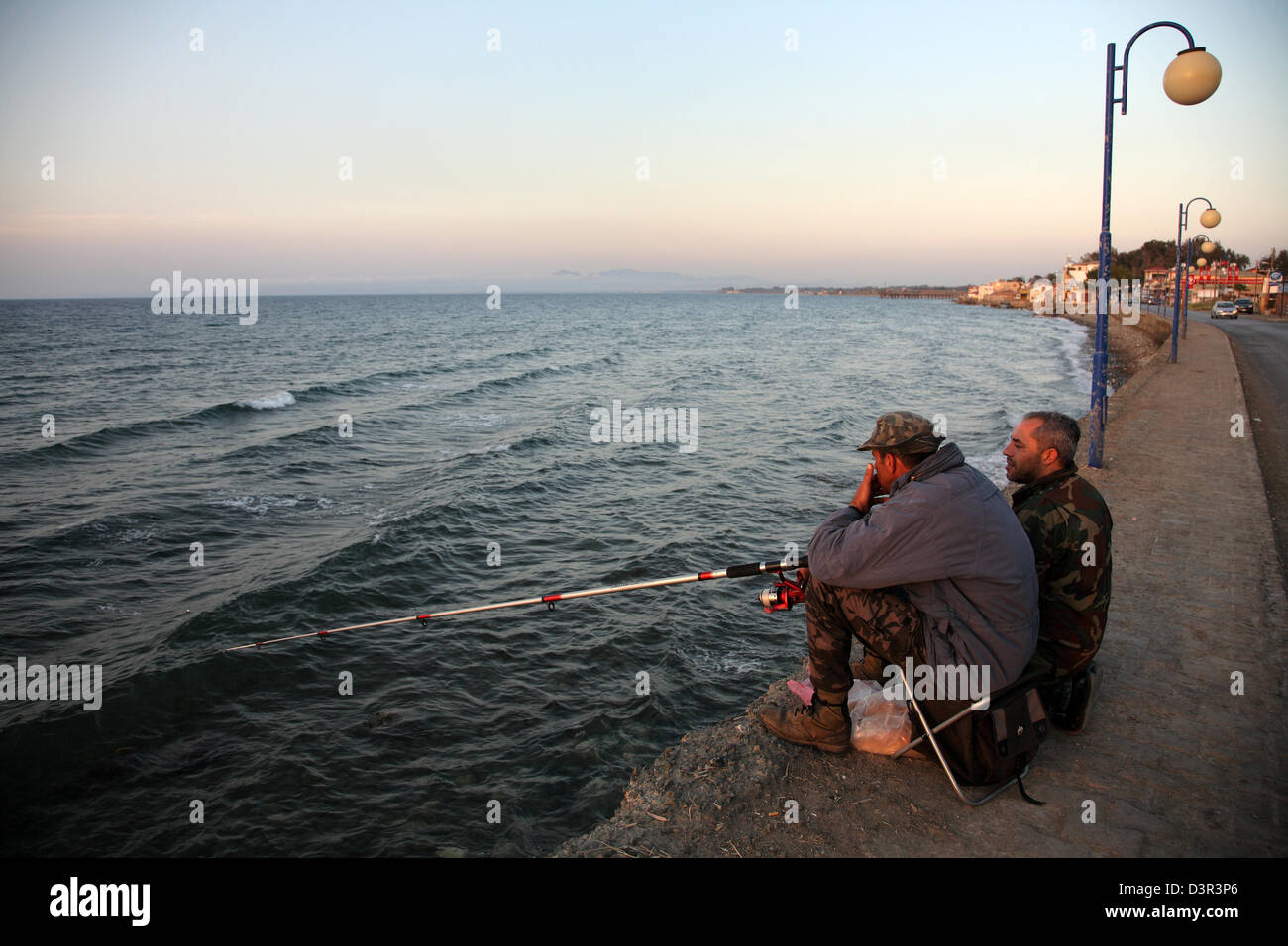 Yesilyurt, Turk Republic of Northern Cyprus, anglers on the Morphou Bay ...