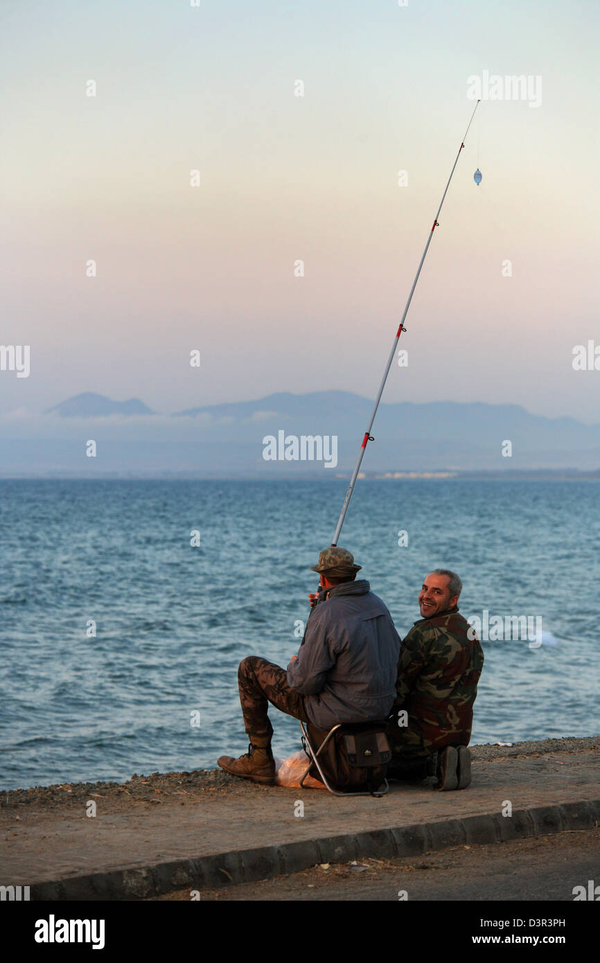 Yesilyurt, Turk Republic of Northern Cyprus, anglers on the Morphou Bay ...