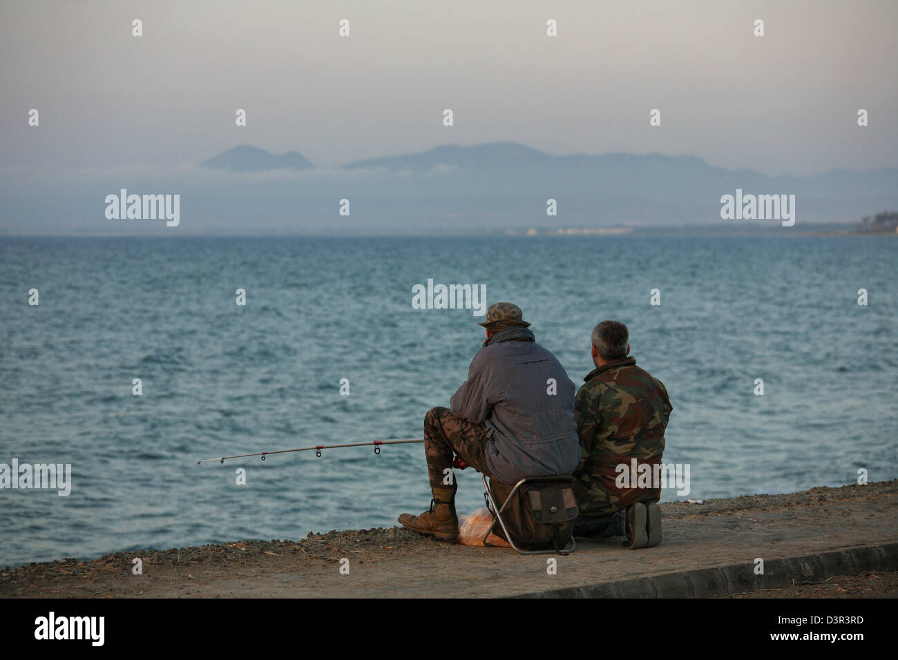 Yesilyurt, Turk Republic of Northern Cyprus, anglers on the Morphou Bay ...