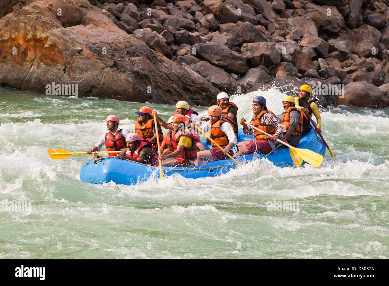 Tourists enjoying whitewater rafting in River Ganges, Rishikesh ...