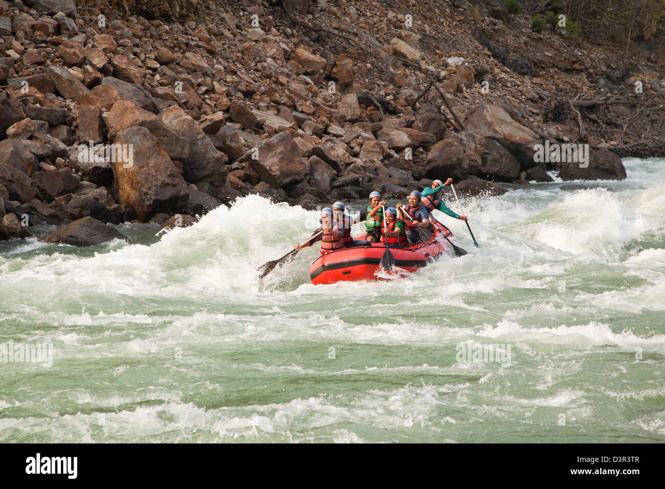 Tourists enjoying whitewater rafting in River Ganges, Rishikesh ...