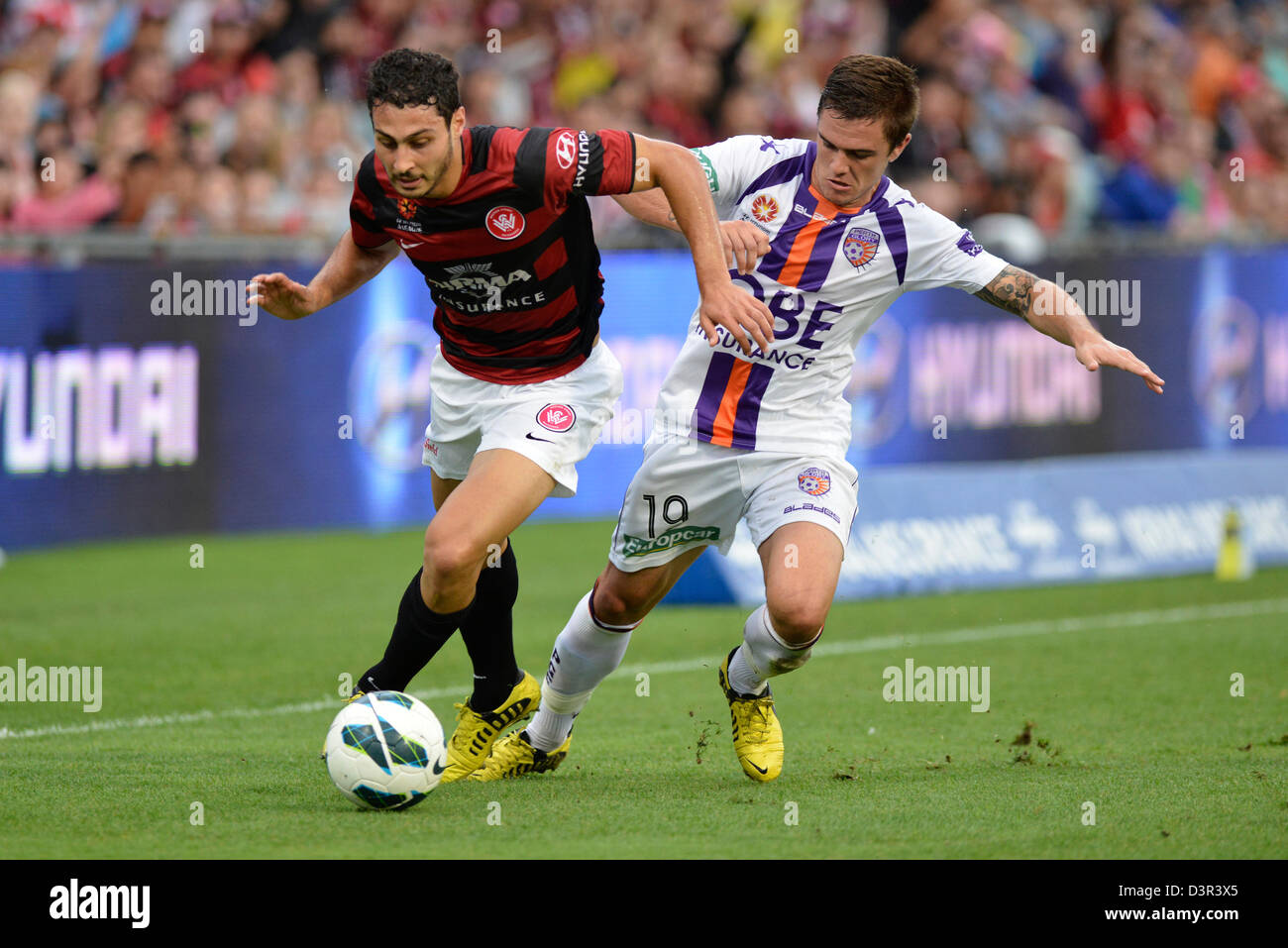 23.02.2013 Sydney, Australia.Wanderers defender Adam D'Apuzzo and Perth ...
