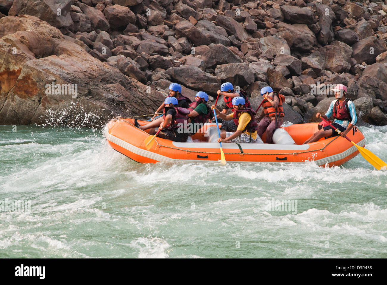 Tourists enjoying whitewater rafting in River Ganges, Rishikesh ...