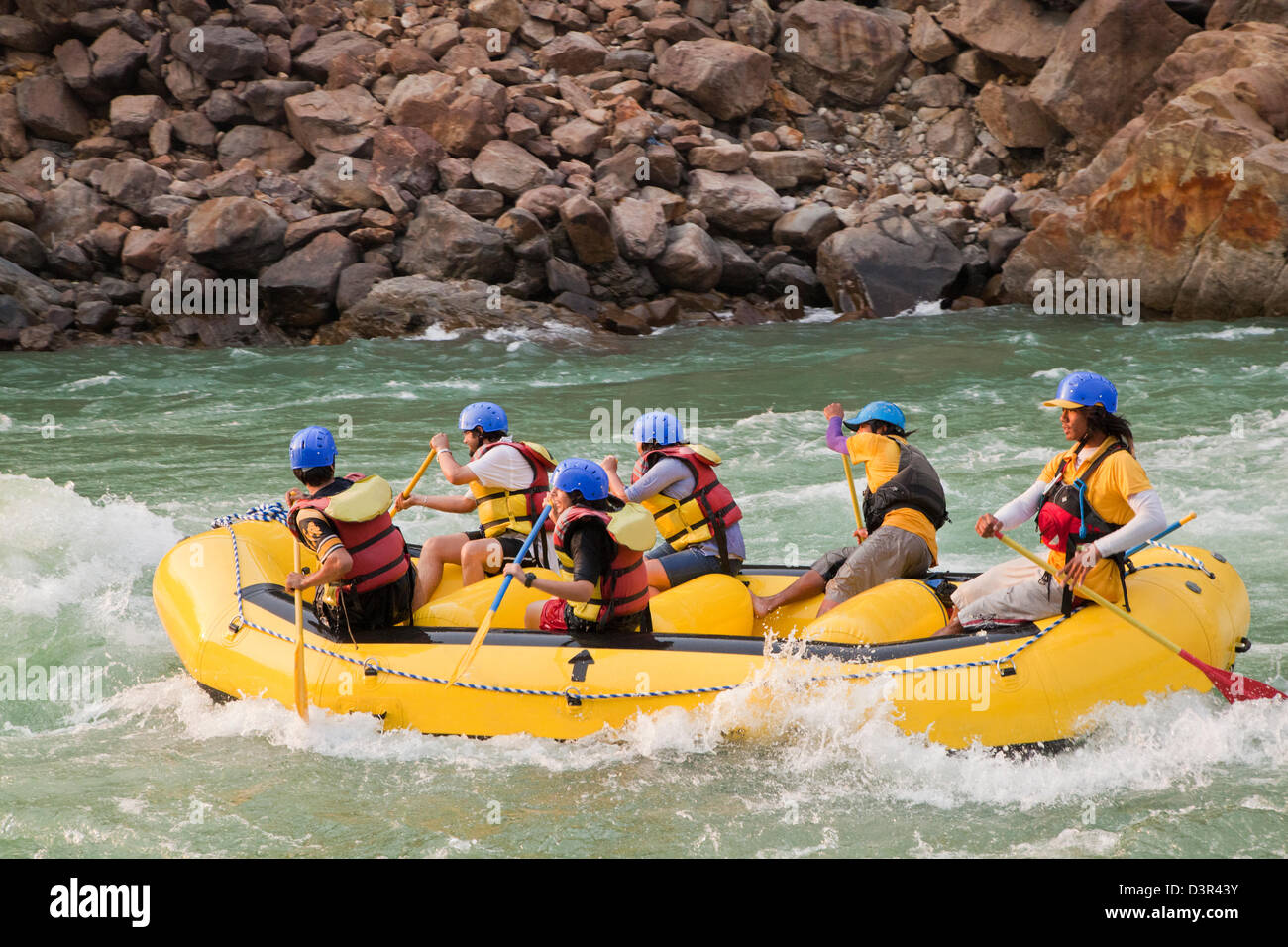 Tourists enjoying whitewater rafting in River Ganges, Rishikesh ...