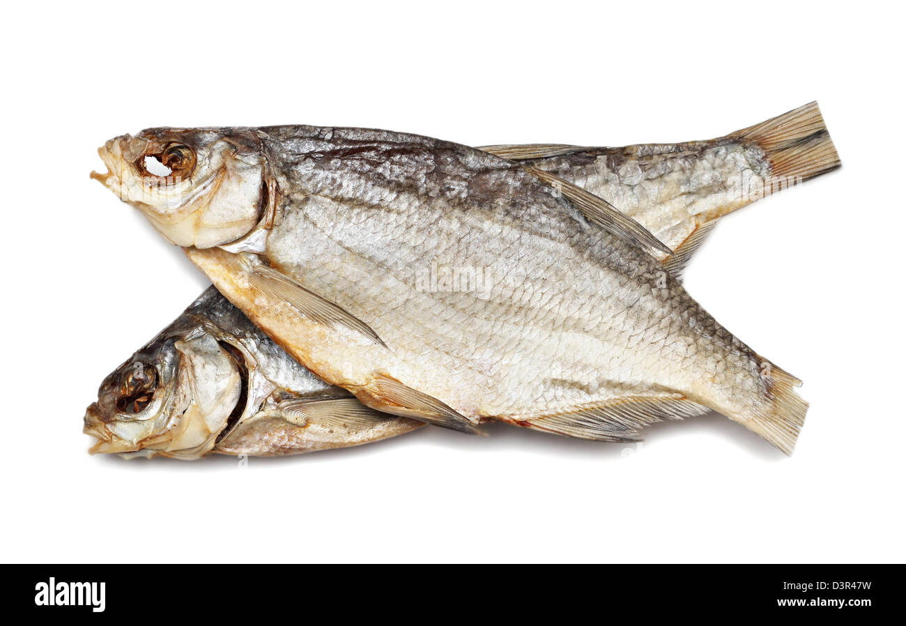 Two dried fishes isolated on white background Stock Photo - Alamy