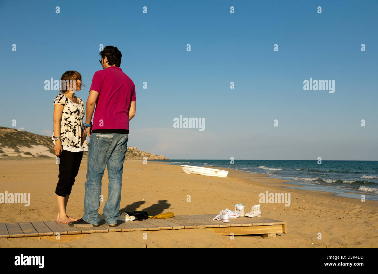 Dipkarpaz, Turk Republic of Northern Cyprus, a couple at Golden Beach ...