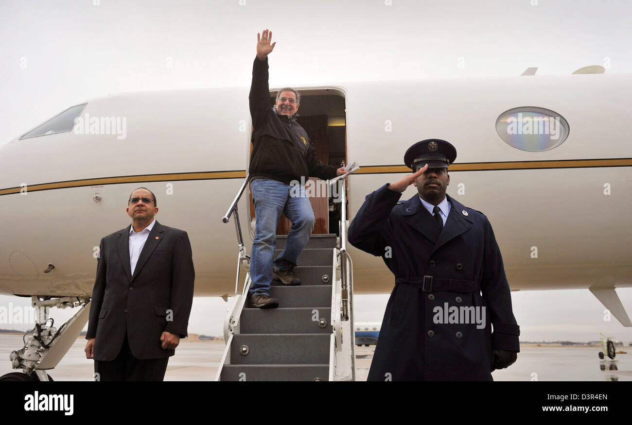 US Secretary of Defense Leon Panetta waves goodbye as he boards a G-5 ...