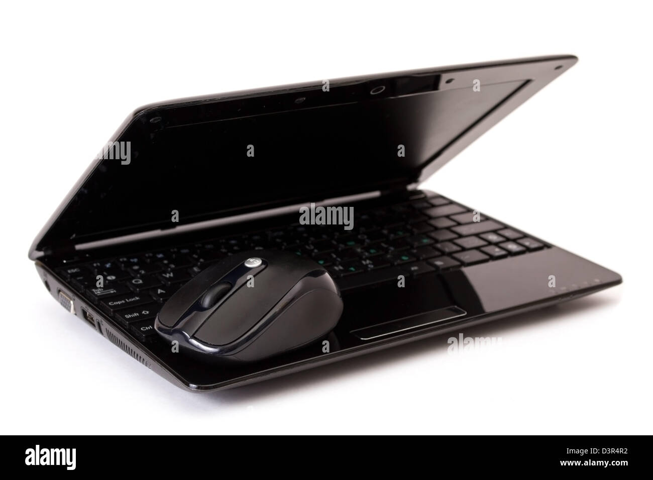 Laptop and mouse on white Stock Photo - Alamy