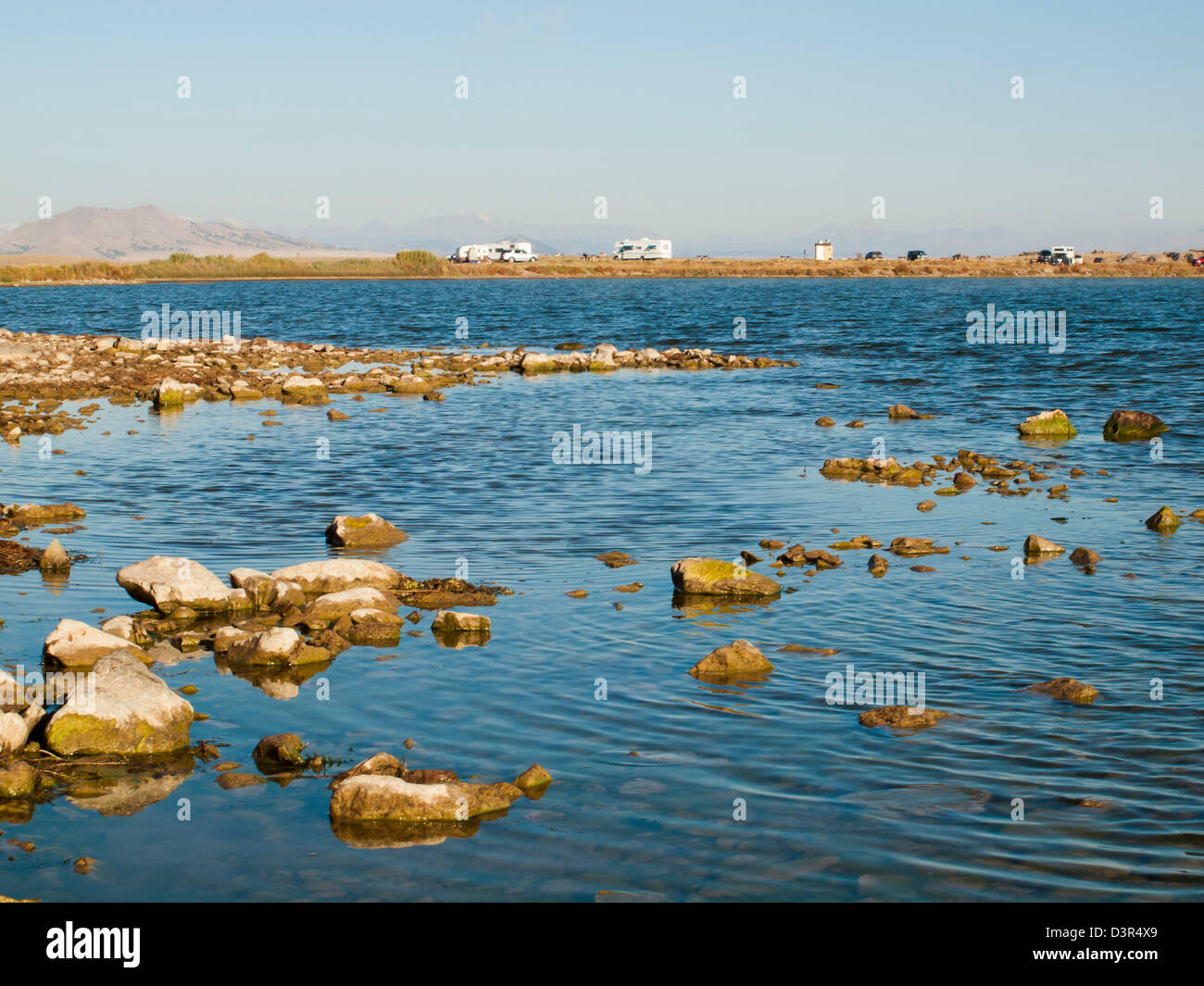 Motorhome campsite near the lake on early morning late in the season ...