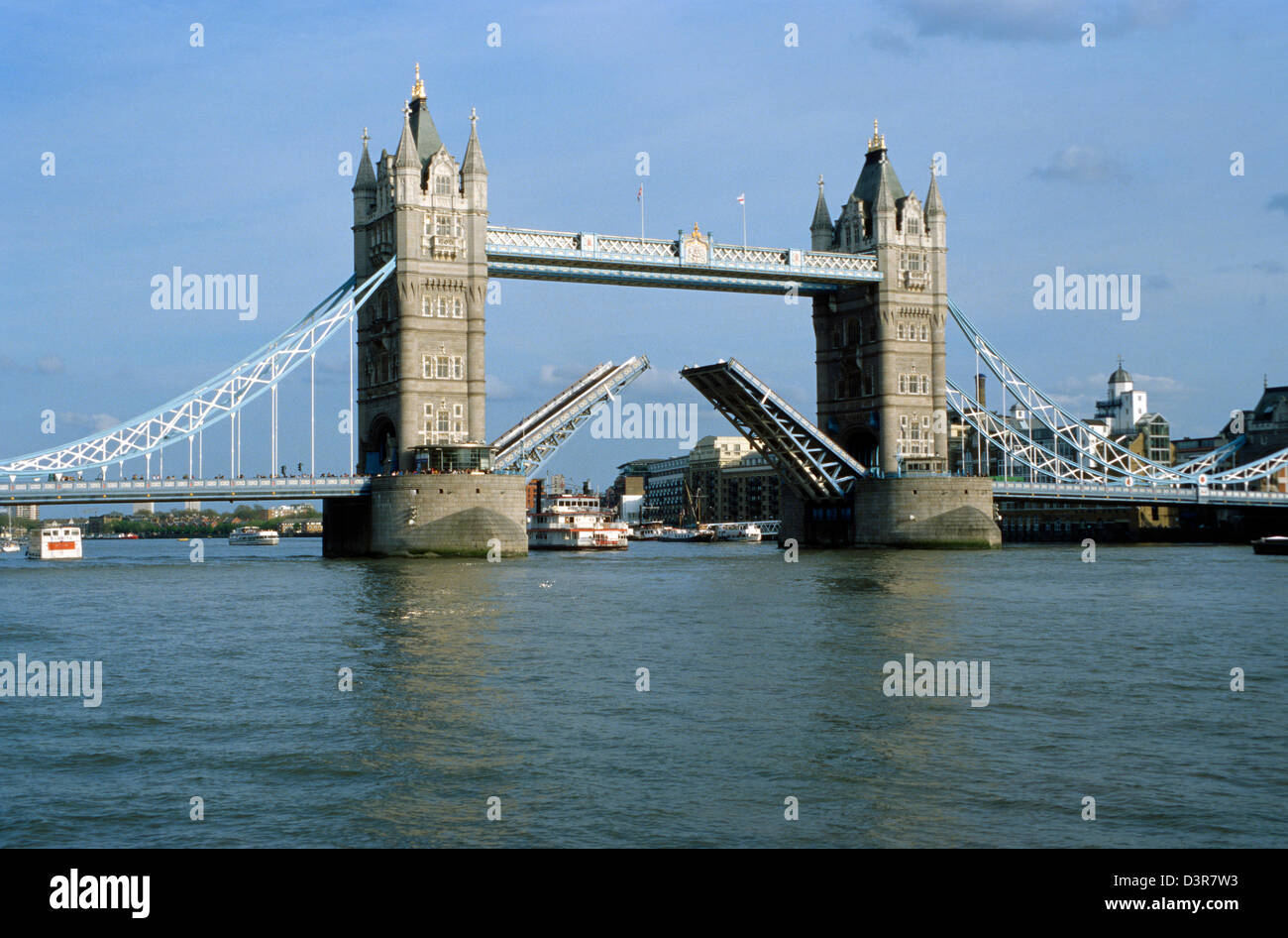 Tower Bridge, London, showing the two halves opening to allow tall ...