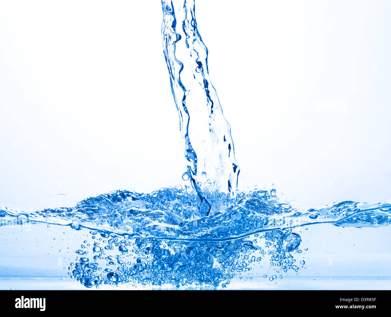Stream of Water Falling into the Water, closeup Stock Photo - Alamy