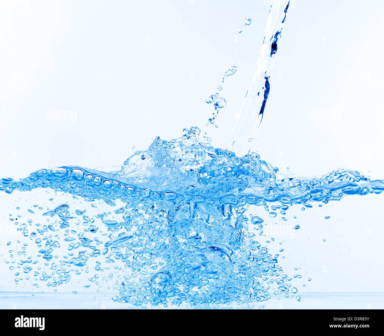 Stream of Water Falling into the Water, closeup Stock Photo - Alamy