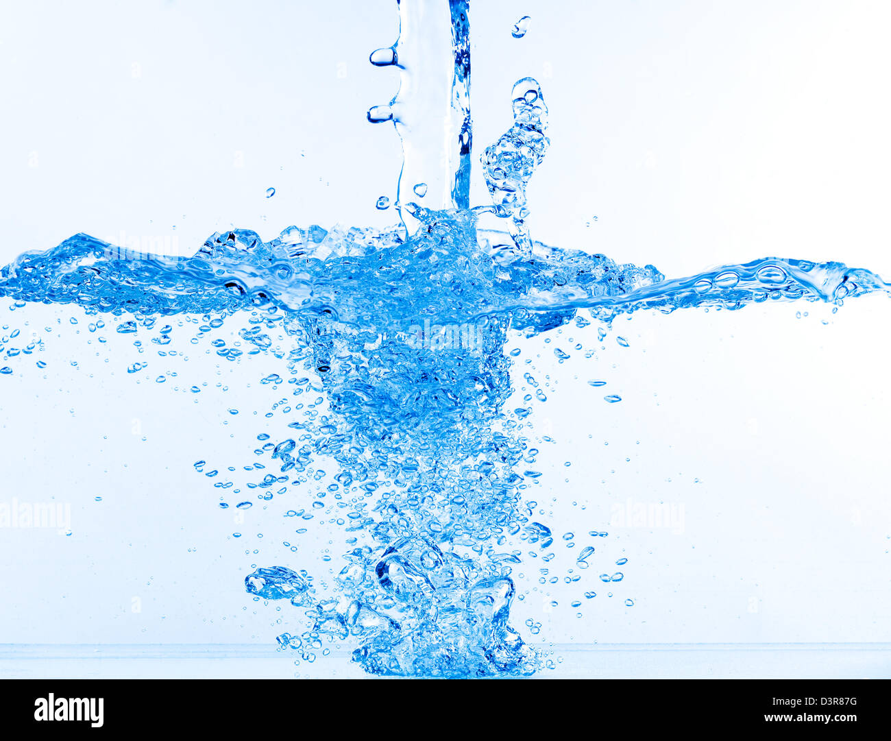 Stream of Water Falling into the Water, closeup Stock Photo - Alamy
