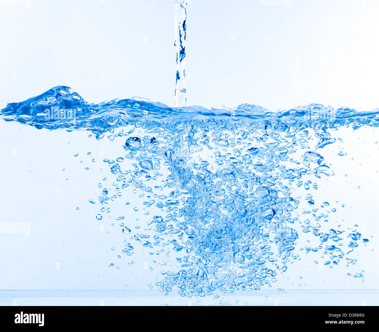 Stream of Water Falling into the Water, closeup Stock Photo - Alamy