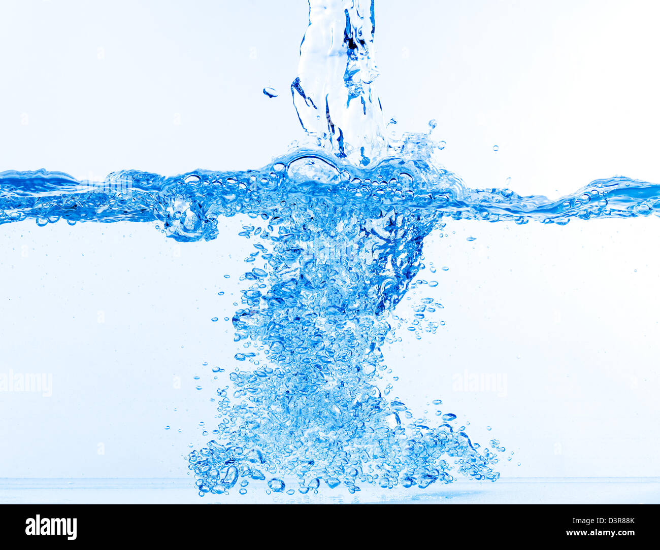 Stream of Water Falling into the Water, closeup Stock Photo - Alamy