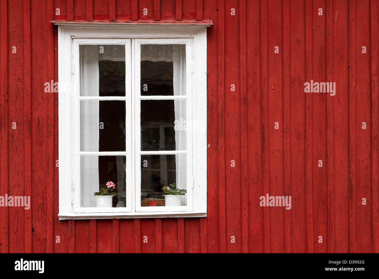 Window in red wooden wall Stock Photo - Alamy
