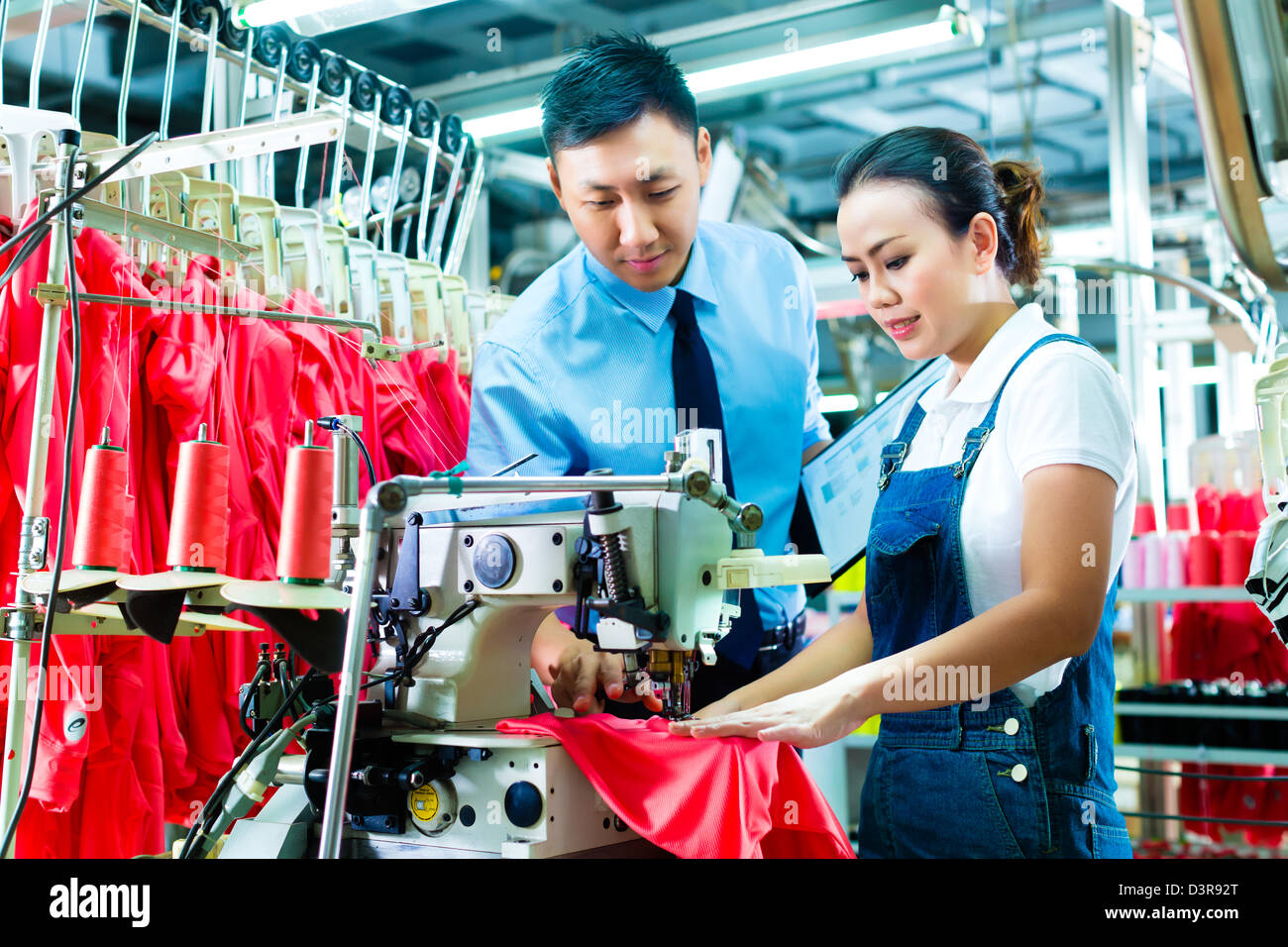 Chinese worker sewing machine hi-res stock photography and images - Alamy