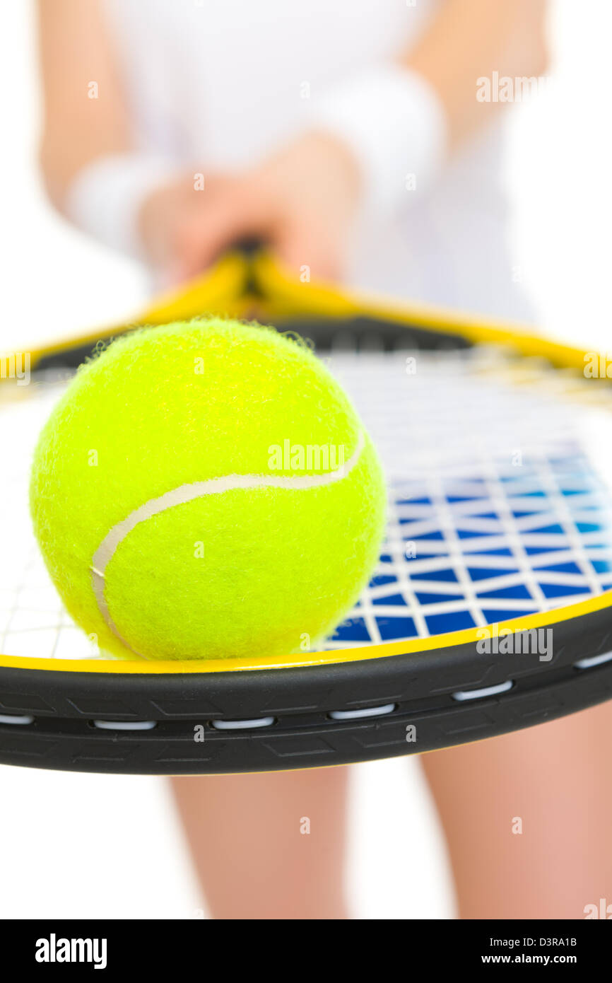 Closeup on ball on racket in hand of tennis player Stock Photo - Alamy