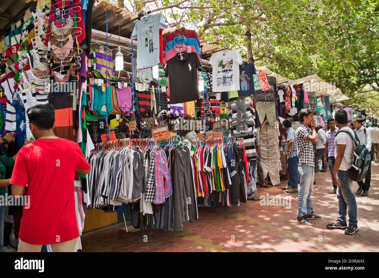 Clothes hanging at a market stall on the street, Mumbai, Maharashtra ...