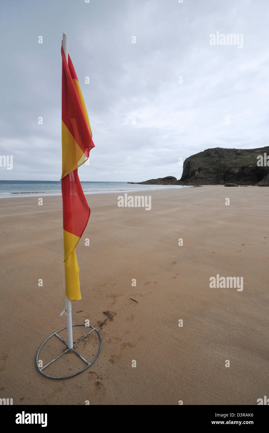Flag showing patrol by lifeguards, Plemont, Jersey Stock Photo - Alamy
