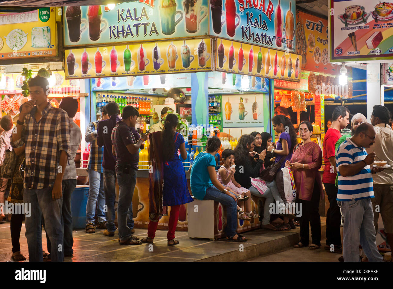 People eating ice cream at a ice cream parlor, Juhu Beach, Mumbai ...