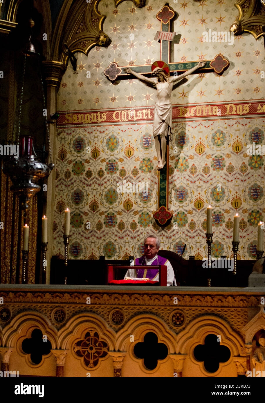 Priest watching over the blood of Christ in the Basilica of the Holy ...