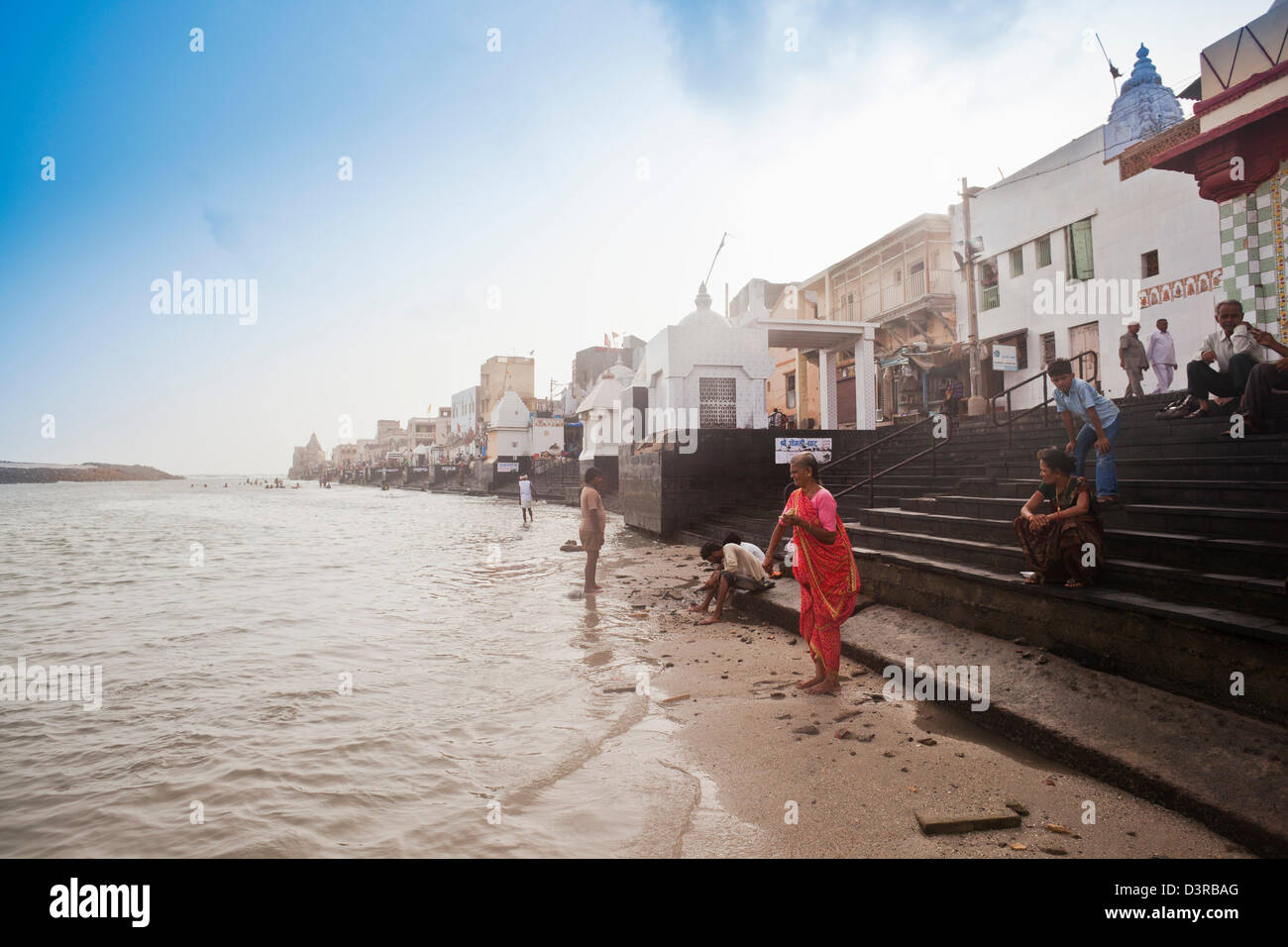 People at Gomati River ghat, Dwarka, Gujarat, India Stock Photo - Alamy