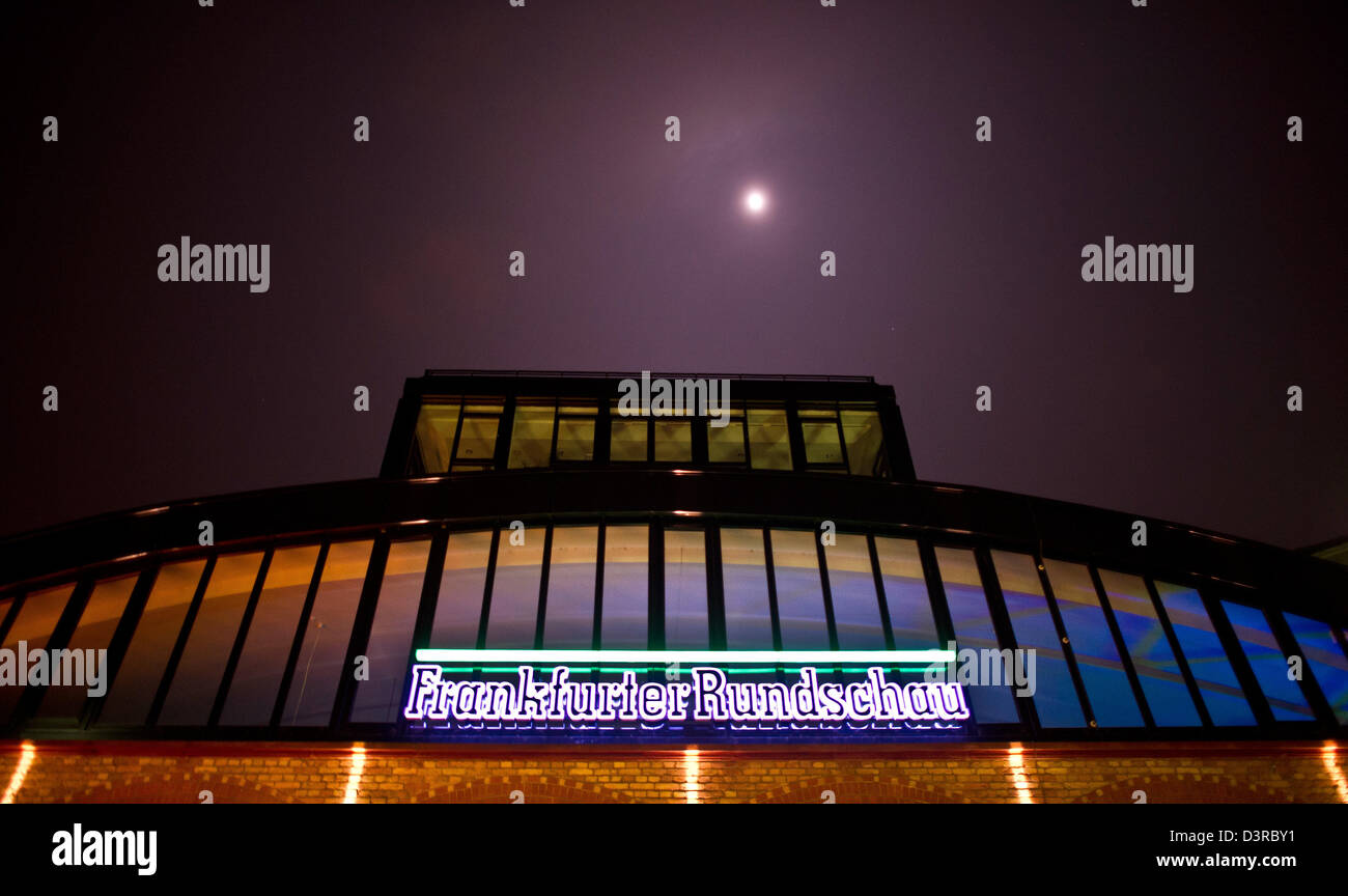 The moon shines above the logo of the Frankfurt Rundschau (FR ...