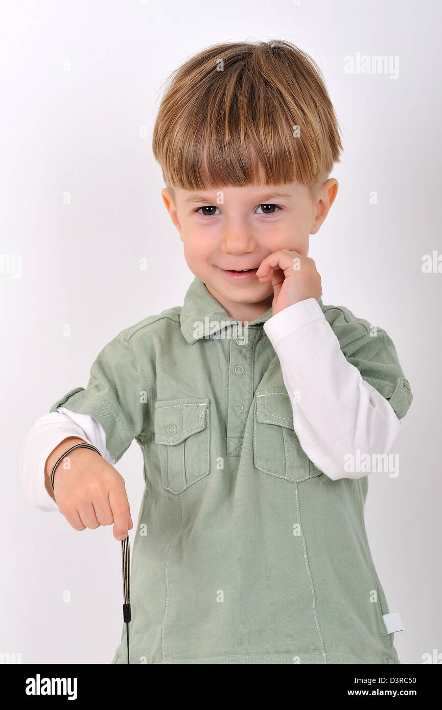 little boy on a light background Stock Photo - Alamy