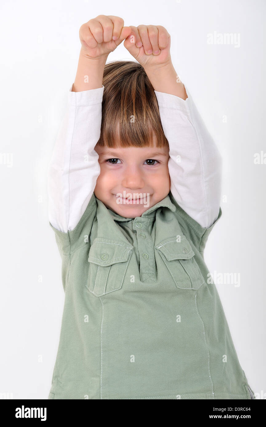 boy with his hand raised Stock Photo - Alamy