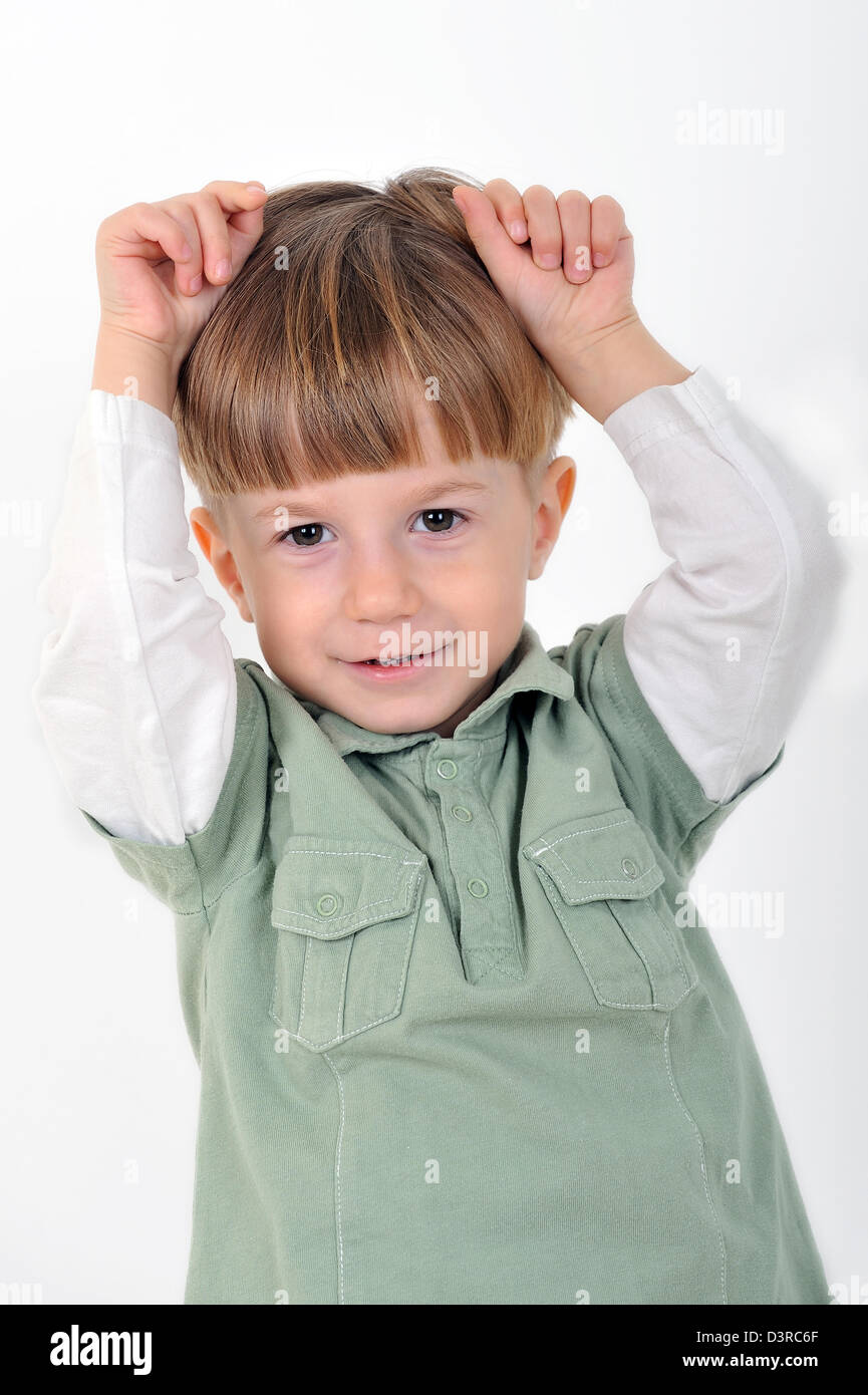 boy with his hand raised Stock Photo - Alamy