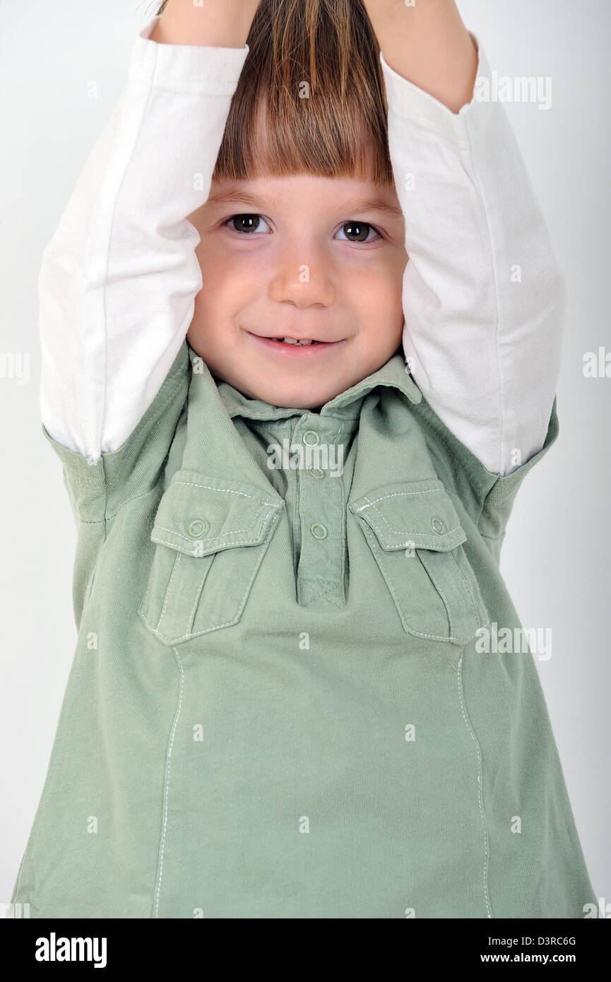 boy with his hand raised Stock Photo - Alamy