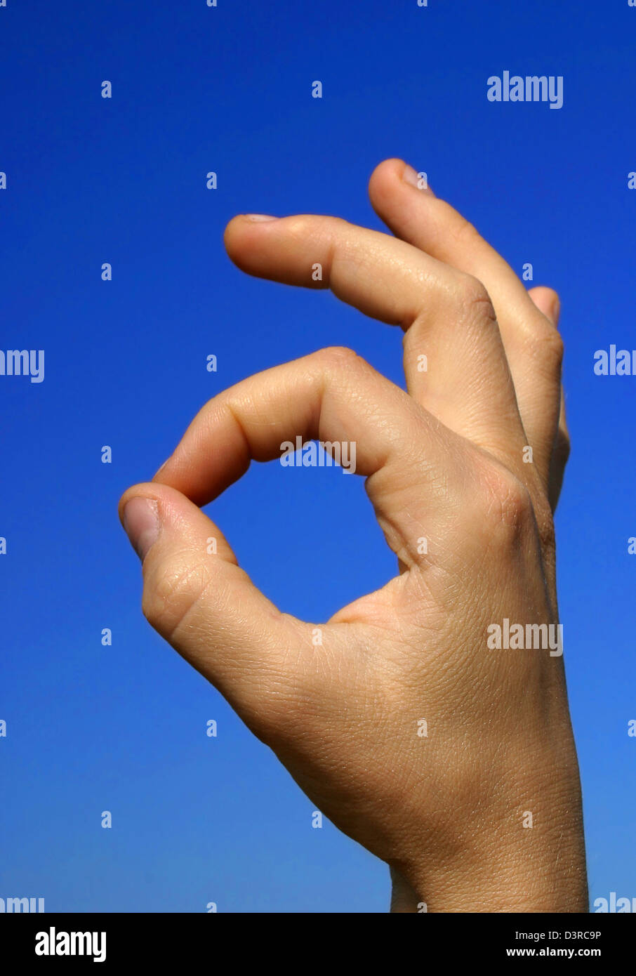 Ok sign making by fingers Stock Photo - Alamy